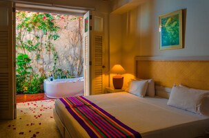 Quarto Deluxe | Minibar, cofre no quarto, secretária, Wi-fi grátis 