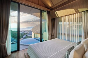 Cottages Suite Seaview | Minibar, cofre no quarto, com decoração personalizada 