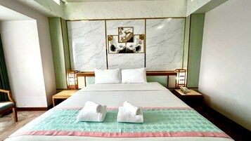 Deluxe Room | Minibar, cofre no quarto, secretária, camas desdobráveis 