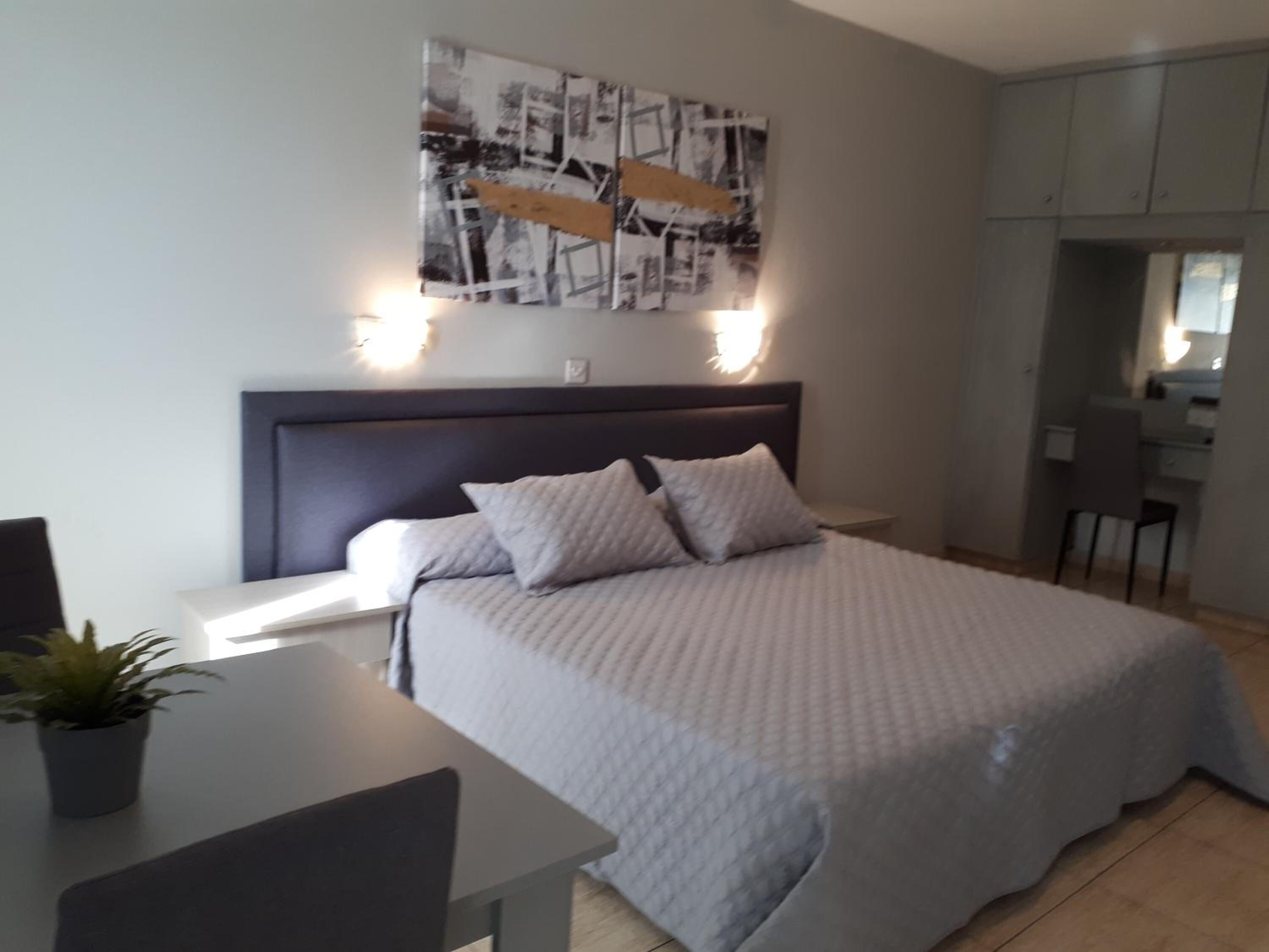 Cofre no quarto, ferro/tábua de engomar 