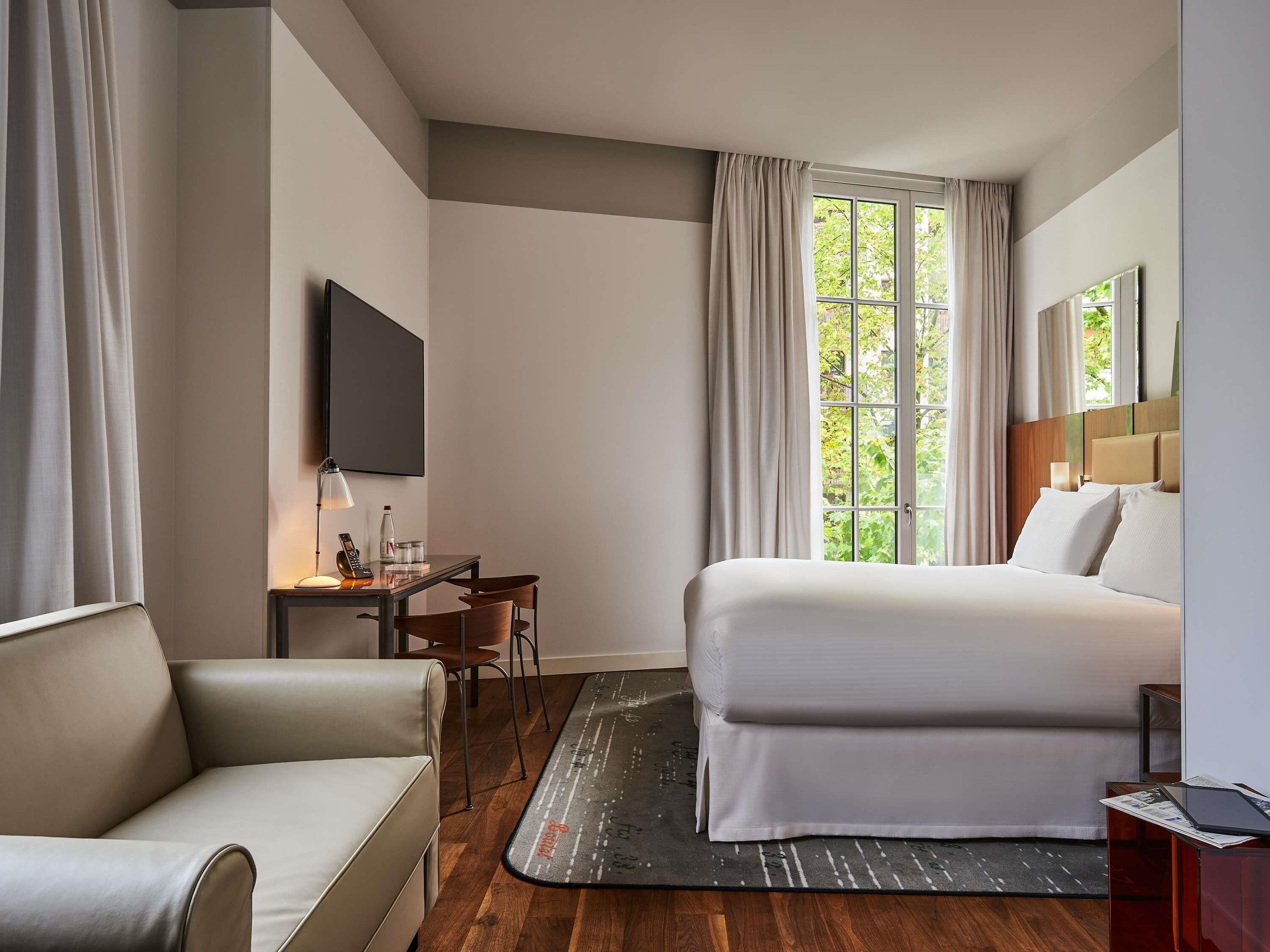Suíte júnior, 1 cama King | Roupas de cama premium, frigobar, cofres nos quartos, escrivaninha