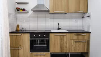 Apartamento Executivo | Cozinha privada | Uma cafeteira/bule, uma chaleira elétrica