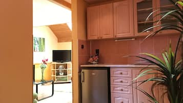 Apartamento | Cozinha privada | Geladeira