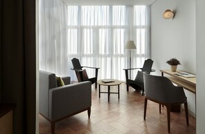 Suite Premium | Sala de estar | Televisor 