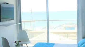 Quarto casal romântico, 1 cama de casal, vista para o oceano | Cofres nos quartos, berços grátis, Wi-Fi de cortesia, roupa de cama