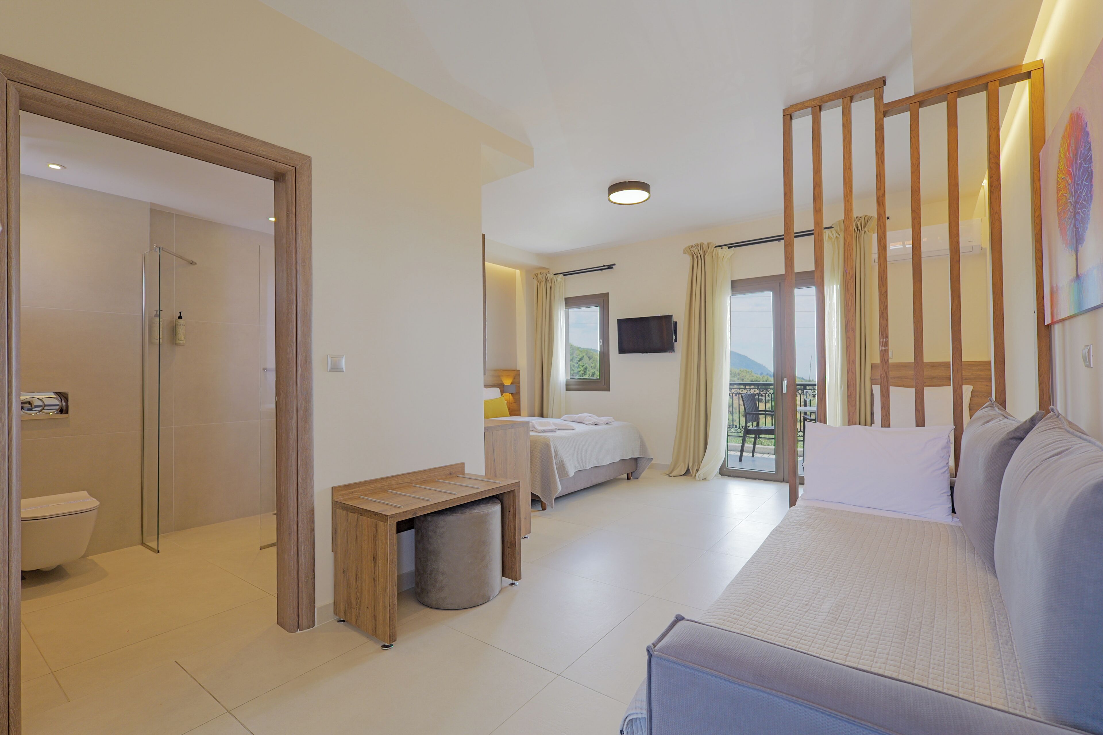 Quarto quádruplo, vista para o mar | Camas com colchões de espuma com sistema de memória, cofres nos quartos