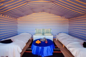 Cofres nos quartos, roupa de cama