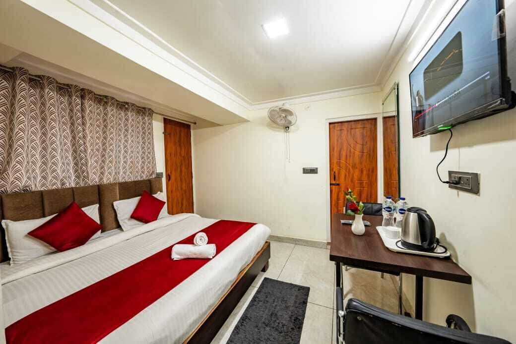 Quarto triplo, vista para a cidade