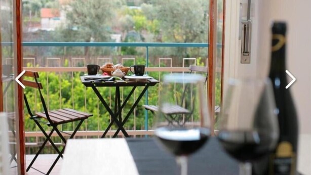 Apartamento Comfort, varanda, Vista para a cidade | Restaurantes