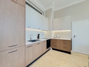 Apartamento Deluxe, Vista para a cidade | Cozinha privada