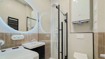 Apartamento Deluxe, Vista para a cidade | Casa de banho