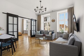 Apartamento superluxo, vista para a cidade | Área de estar