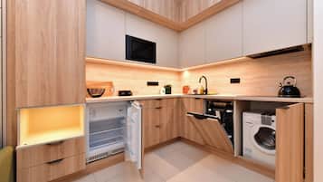 Estúdio conforto, vista para a cidade | Cozinha privada | Micro-ondas, cooktop, chaleira elétrica, toalhas de papel