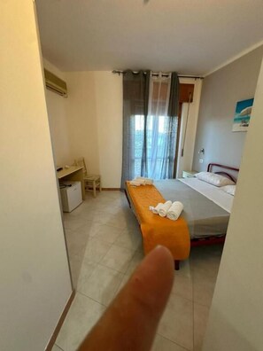 Quarto família, sacada, vista para o mar | Wi-Fi de cortesia