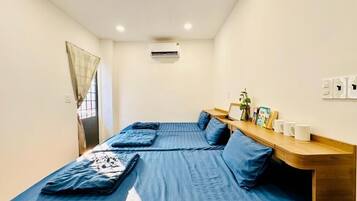 Quarto Triplo Standard, varanda, Vista para a cidade | Secretária, Wi-fi grátis