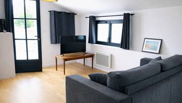 Apartamento superior | Área de estar