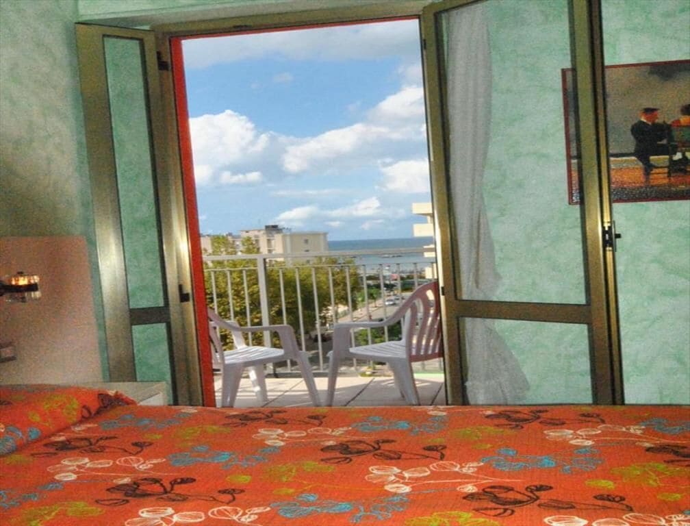 Quarto Quádruplo, varanda | Cofre no quarto, Wi-fi grátis, acesso para cadeira de rodas 