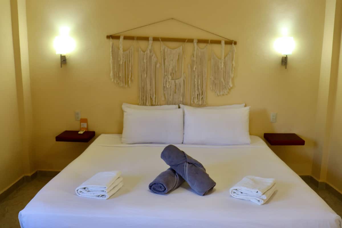 Quarto Deluxe, 1 cama king-size | Wi-fi grátis, roupa de cama fornecida