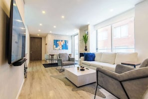 Apartamento, várias camas, banheira de hidromassagem grande, Vista para a cidade (Balcones 303) | Sala de estar