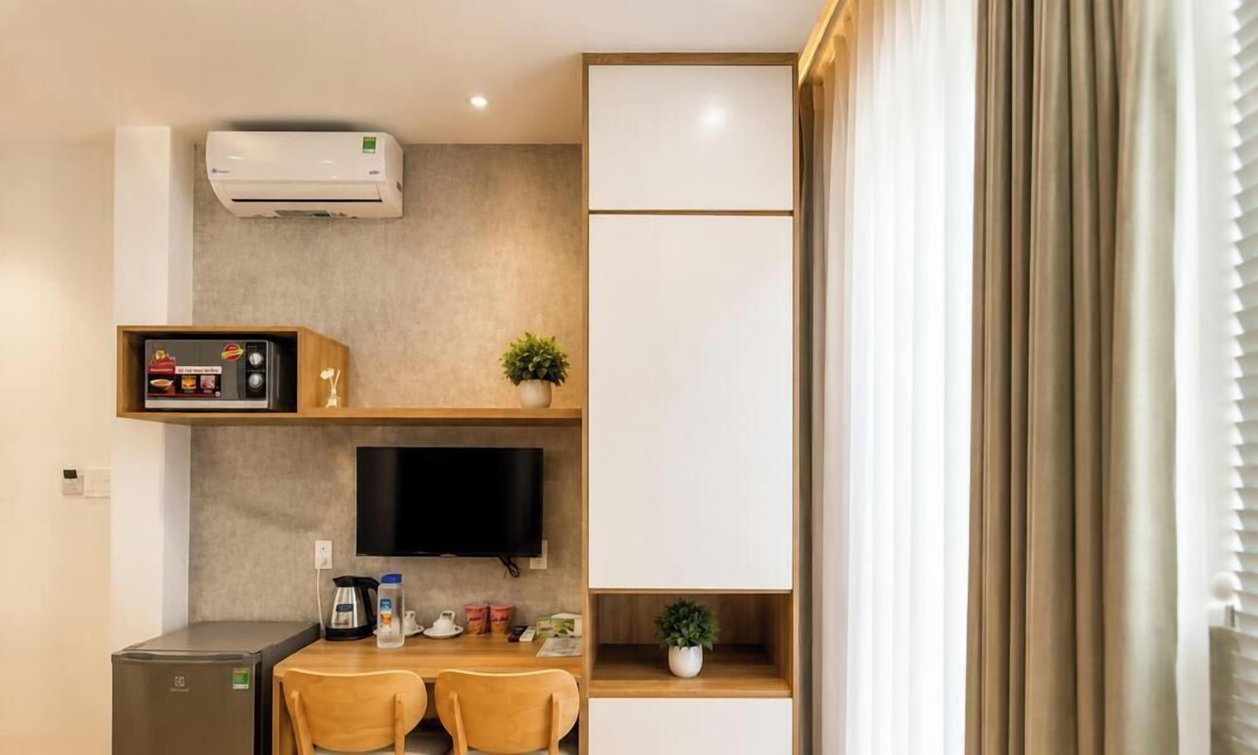 Apartamento superior, vista para a cidade | Cofres nos quartos, escrivaninha, Wi-Fi de cortesia
