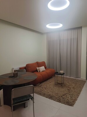 Apartamento, 1 quarto | Sala de estar