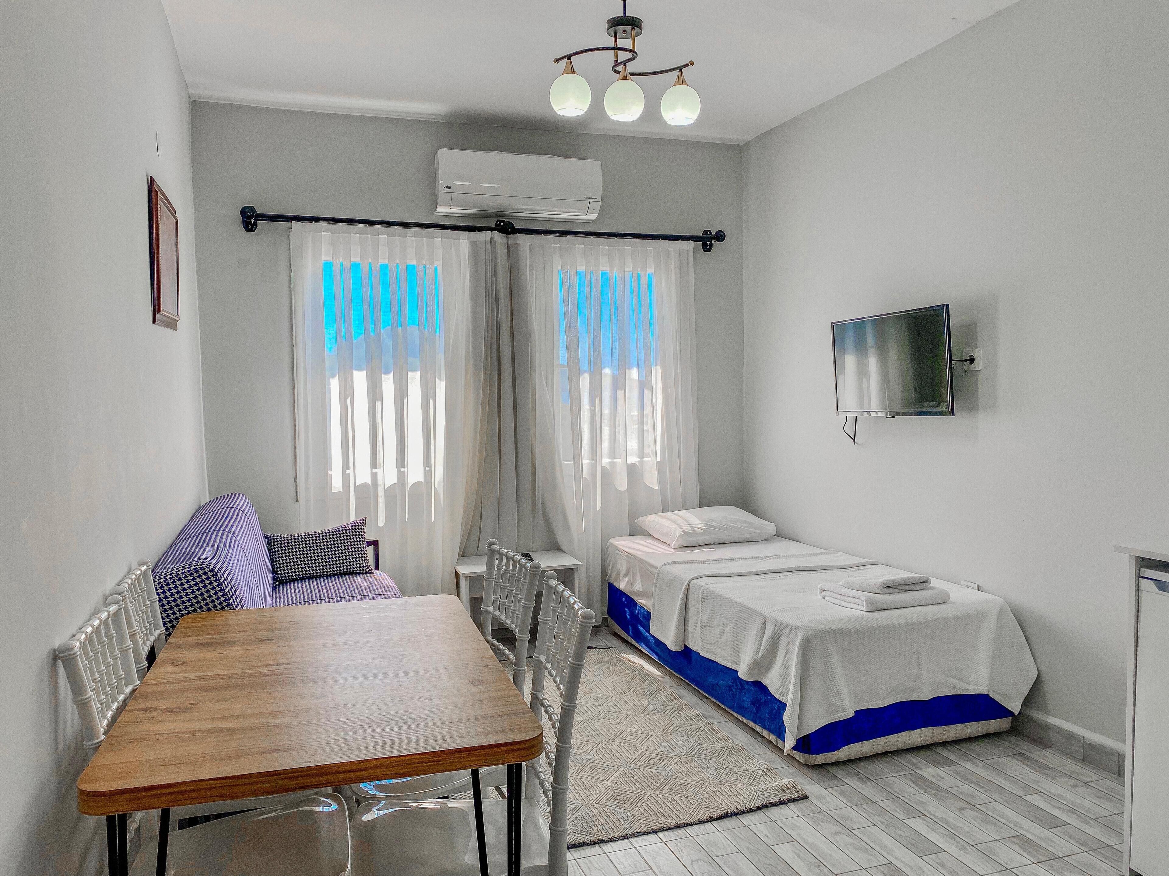 Apartamento, vista para o mar | Cofres nos quartos, Wi-Fi de cortesia