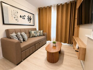 Apartamento conforto, 2 quartos, para não fumantes | Área de estar