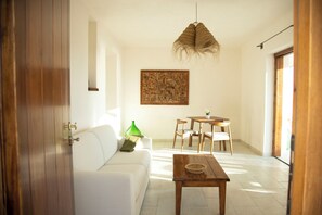 Suite Panorâmica, vista para o mar | Sala de estar
