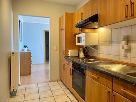 Apartamento | Cozinha privada | Cadeirão de bebê