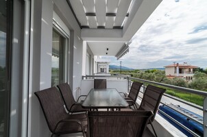 Apartamento Deluxe | Refeições ao ar livre