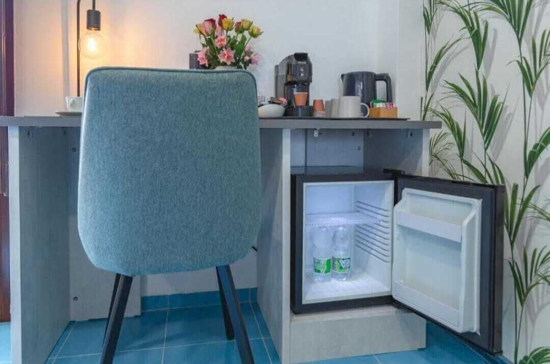Quarto Triplo Deluxe, vista para o mar | Cofre no quarto, secretária, quartos insonorizados 