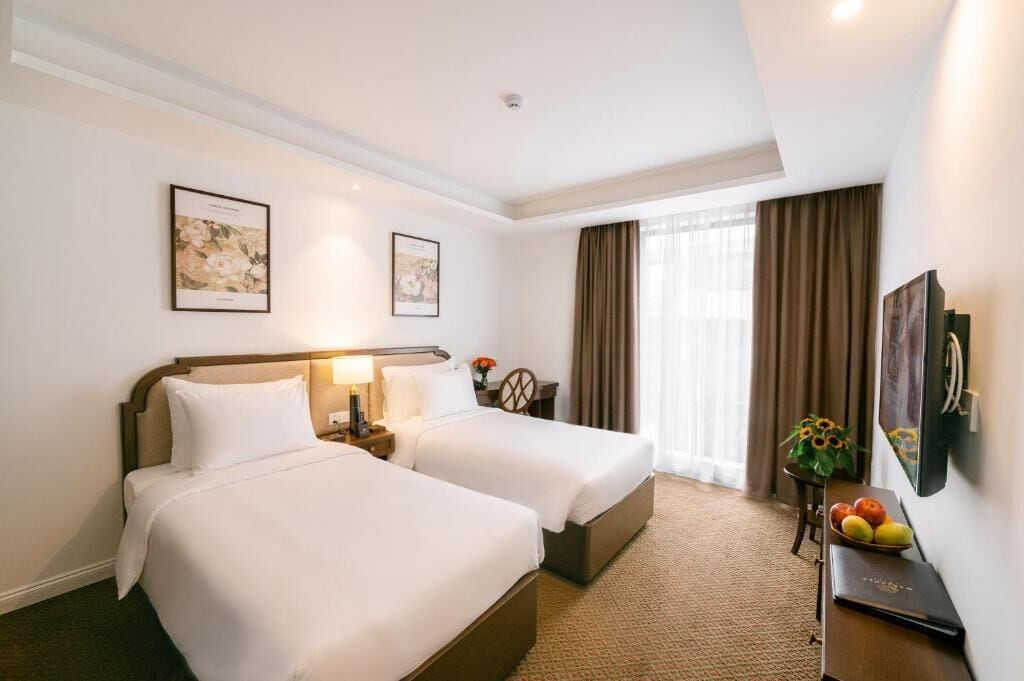 Quarto Twin Premium | Cortinas/cortinados opacos, ferro/tábua de engomar, Wi-fi grátis 