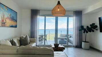 Apartamento, várias camas (Mar a Mar 1201) | Área de estar