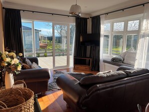 Casa luxo, vista para o jardim | Área de estar