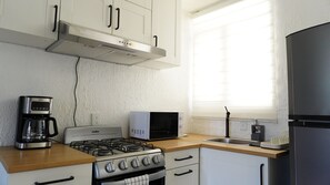 Casa Standard, 2 quartos, aceitam-se animais de estimação | Cozinha privada | Um micro-ondas, utensílios de cozinha 