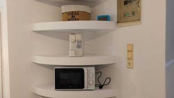 Suite-Estúdio Clássica, 1 cama queen-size, não fumadores, aceitam-se animais de estimação | Sala de estar
