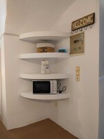 Suite-Estúdio Clássica, 1 cama queen-size, não fumadores, aceitam-se animais de estimação | Sala de estar