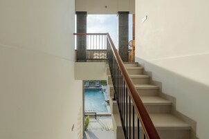 Estúdio Comfort, vista para o jardim | Interior