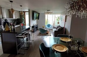 Apartamento Comfort, Vista para a cidade | Sala de estar