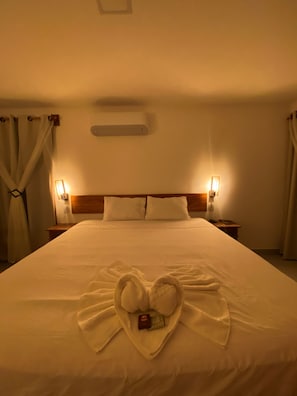 Suíte Chocolate | Frigobar, Wi-Fi de cortesia, roupa de cama