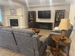 Apartamento Familiar, vista para o jardim | Sala de estar