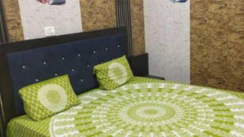 Quarto Deluxe | Casa de banho | Um polibã, toalhas fornecidas