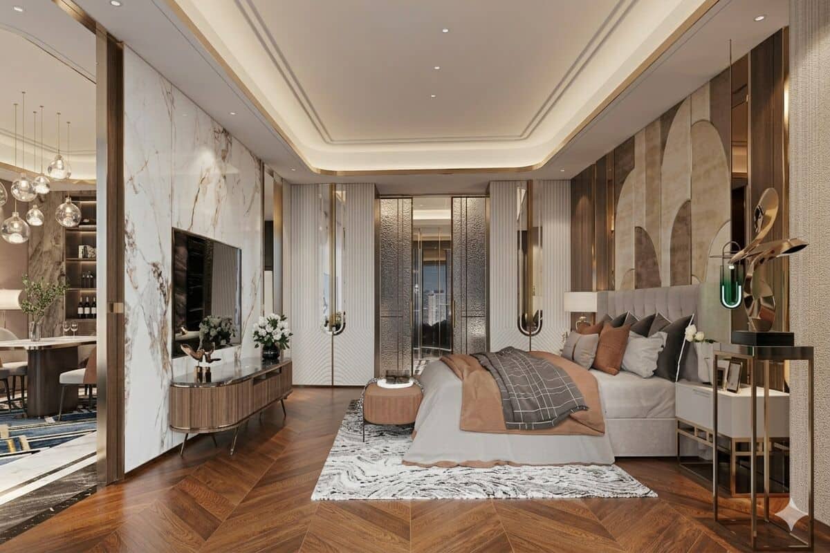 Quarto moderno com uma cama grande, toucador e área de refeições.