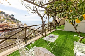 Apartamento Deluxe, vista para o mar | Terraço/pátio interior