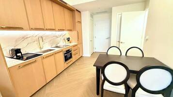 Apartamento, 1 quarto, Vista para a cidade | Sala de jantar