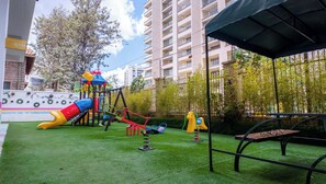 Apartamento Deluxe | Área para crianças
