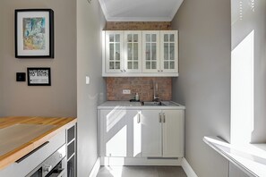 Apartamento Deluxe, vista para o jardim | Cozinha privada
