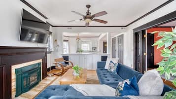 Apartamento família, varanda | Área de estar