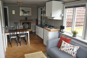 Apartamento, 3 quartos, lareira | Sala | Livros 