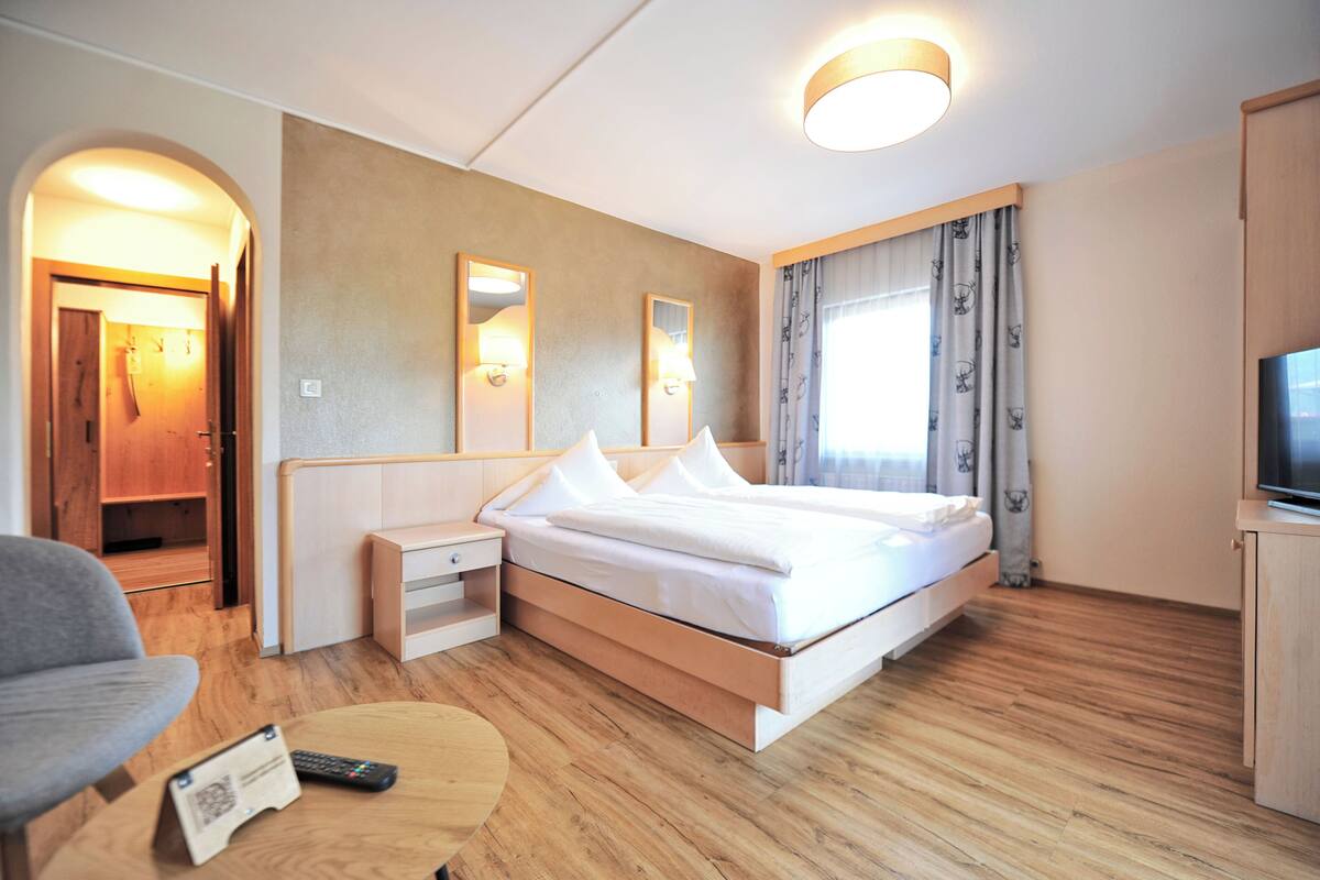 Quarto família | Cofres nos quartos, cortinas blackout, Wi-Fi de cortesia, roupa de cama